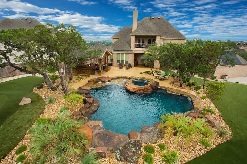 15 Splendid Rustic Swimming Pool Designs That Offer A Unique Experience