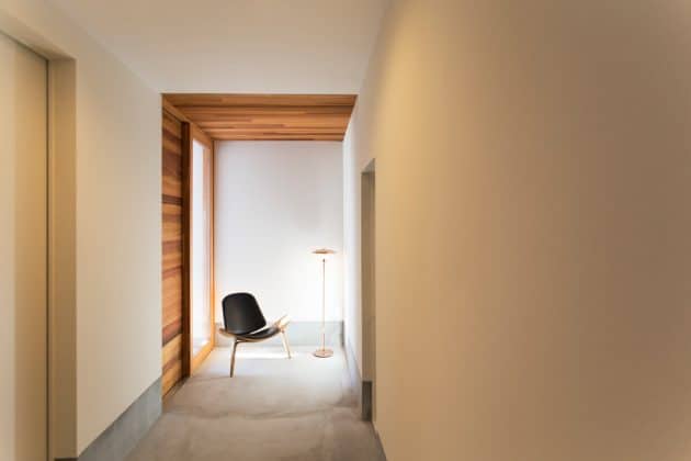 16 Clean & Simple Modern Hallway Designs That Do More Than Their Job