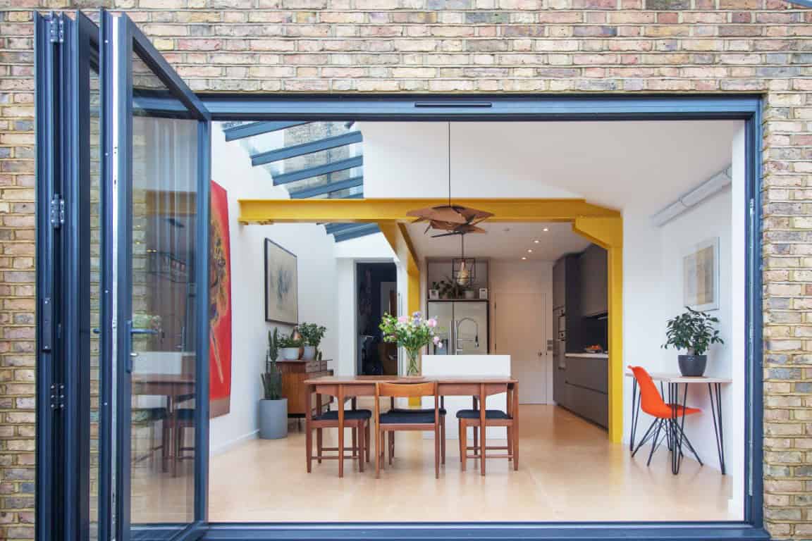 Yellow Steel House Extension by CVC Architecture in North London, UK