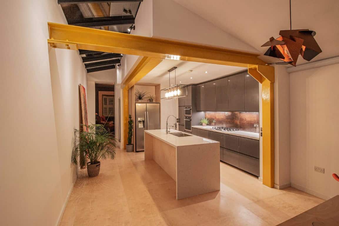 Yellow Steel House Extension by CVC Architecture in North London, UK