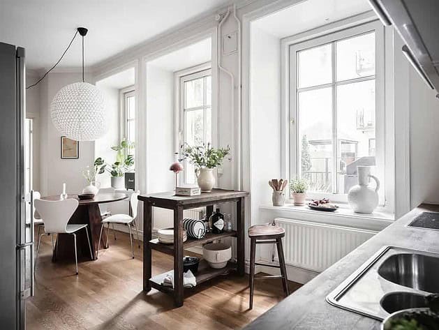 Look At The Work Table That Serves As A Kitchen Island